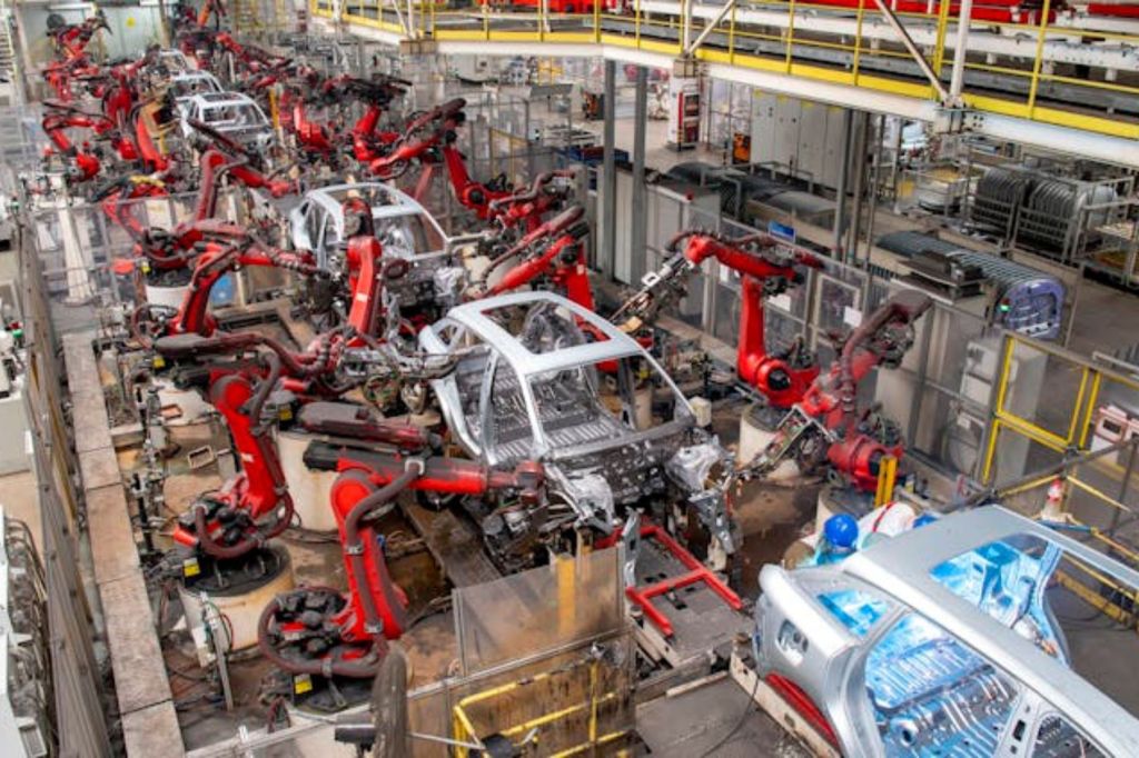 Is AI really coming for our jobs and wages? The most likely ‘robot ...